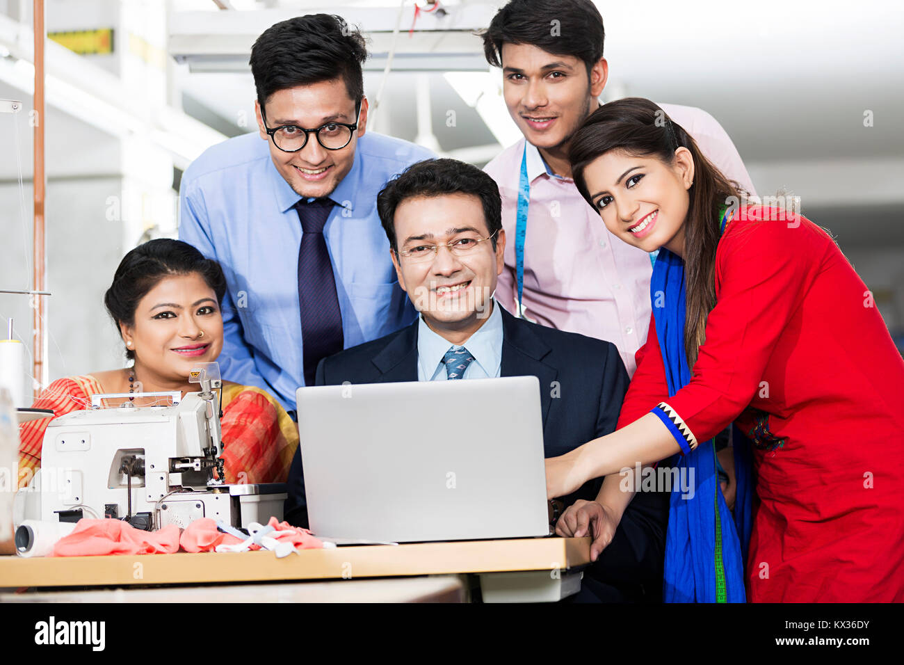 GroupTailor s And Supervisor Using Laptop Discussing Meeting Sewing ...