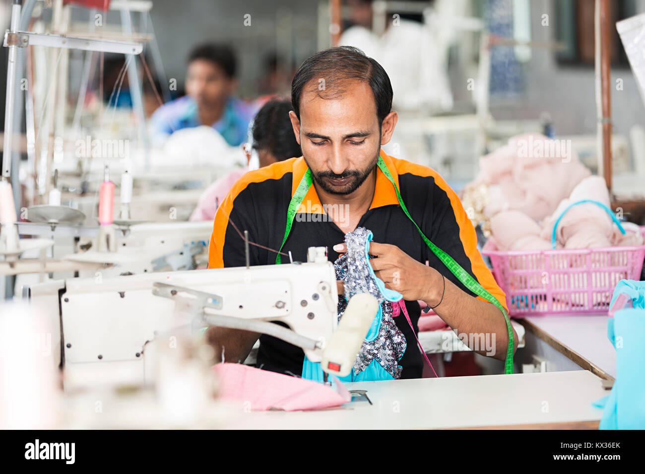Indian man tailor working on hi-res stock photography and images - Alamy