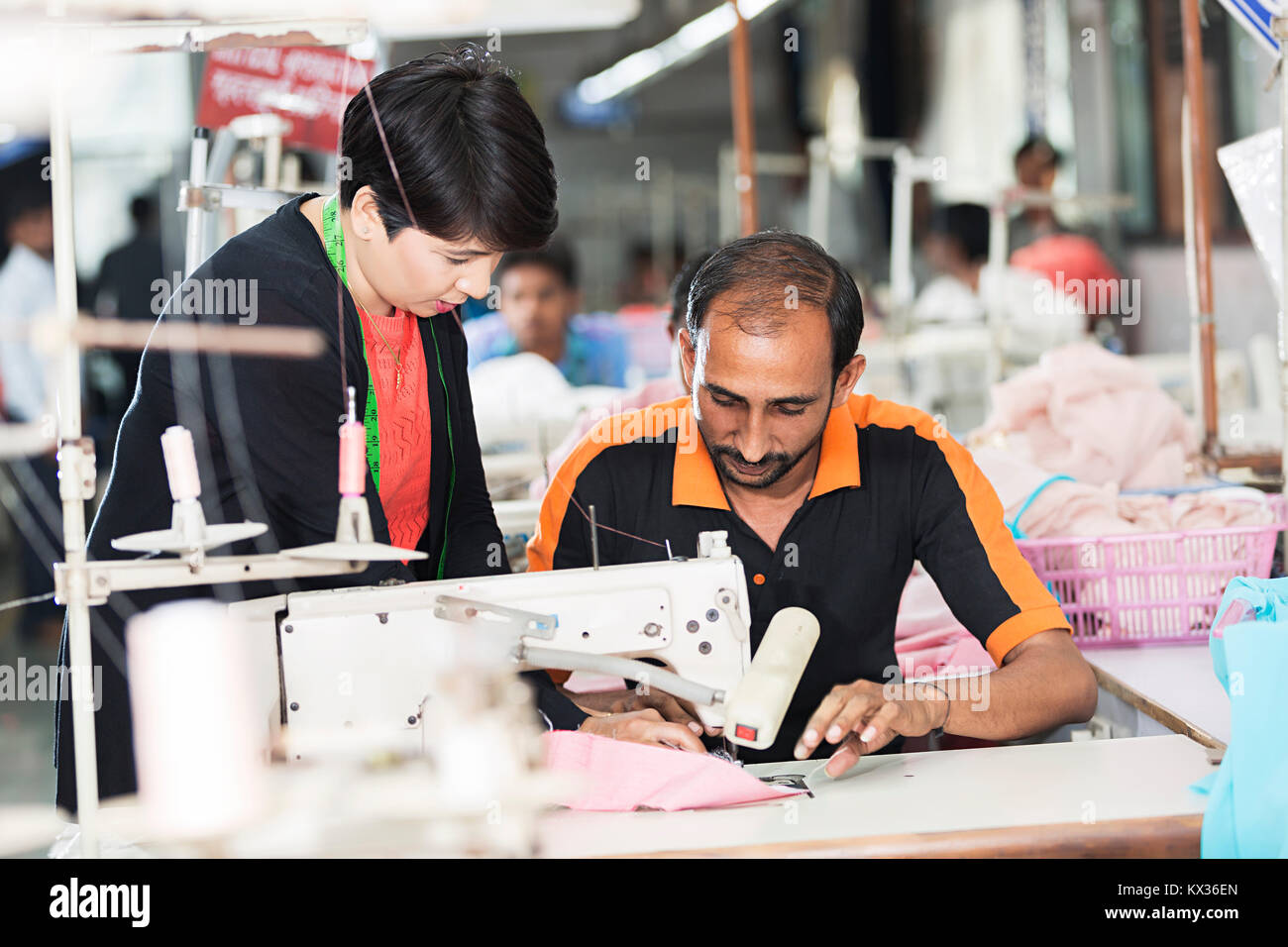 Smiling 1 Man Worker Tailor Working In Garment factory Stock Photo - Alamy