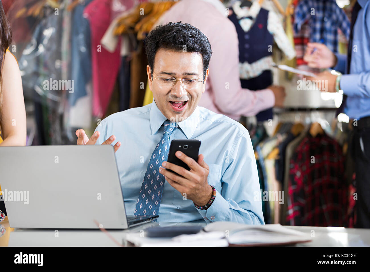 1 Business Man Manager laptop Working And Talking Cell-Phone Store ...