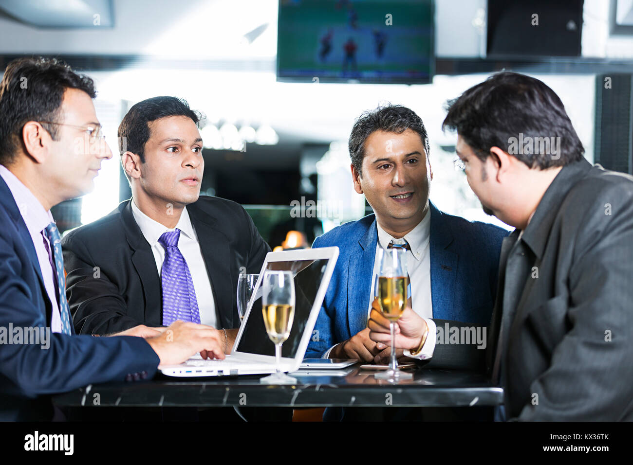 Four Business Men Partners Doing Work Discussing Meetings Talking In ...