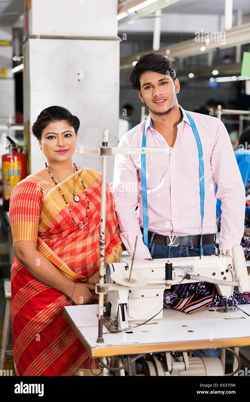 1 Male Worker Tailor Sewing Machine Clothes Working In Factory Stock ...