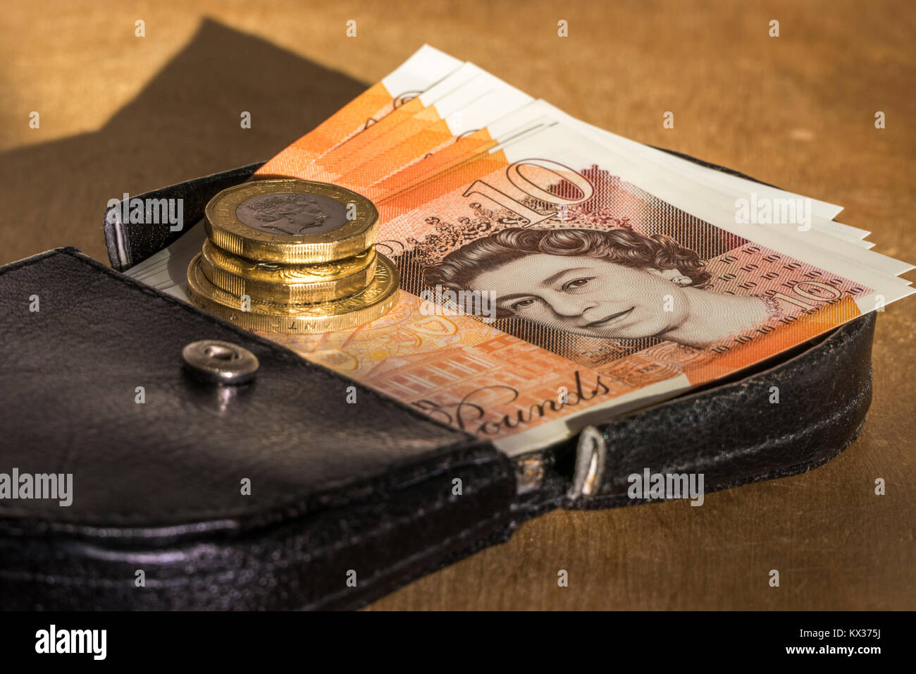 New british money in wallet hi-res stock photography and images - Alamy
