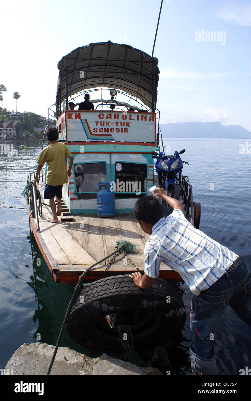 Ferry boat and pier, Tuk-tuk, Samosir island, lake Toba, Sumatra Stock ...