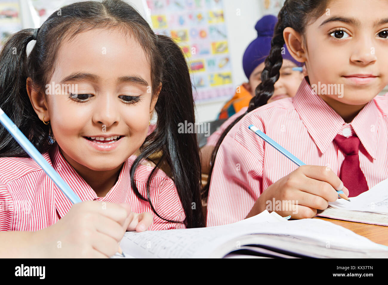 2 Indian School Children Students Girls Writing Notebook Studying ...