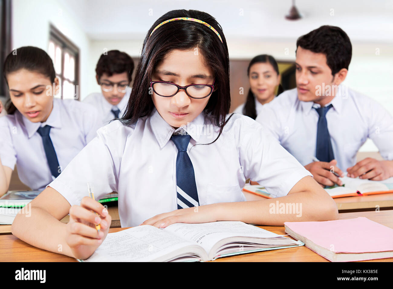 Indian School Students Girl Reading Book Study Education In Class Stock ...