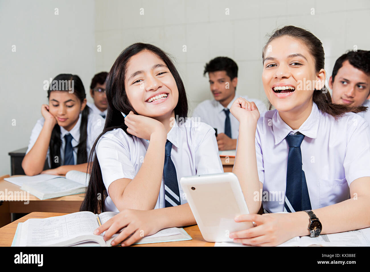 Personal digital assistant and student hi-res stock photography and ...