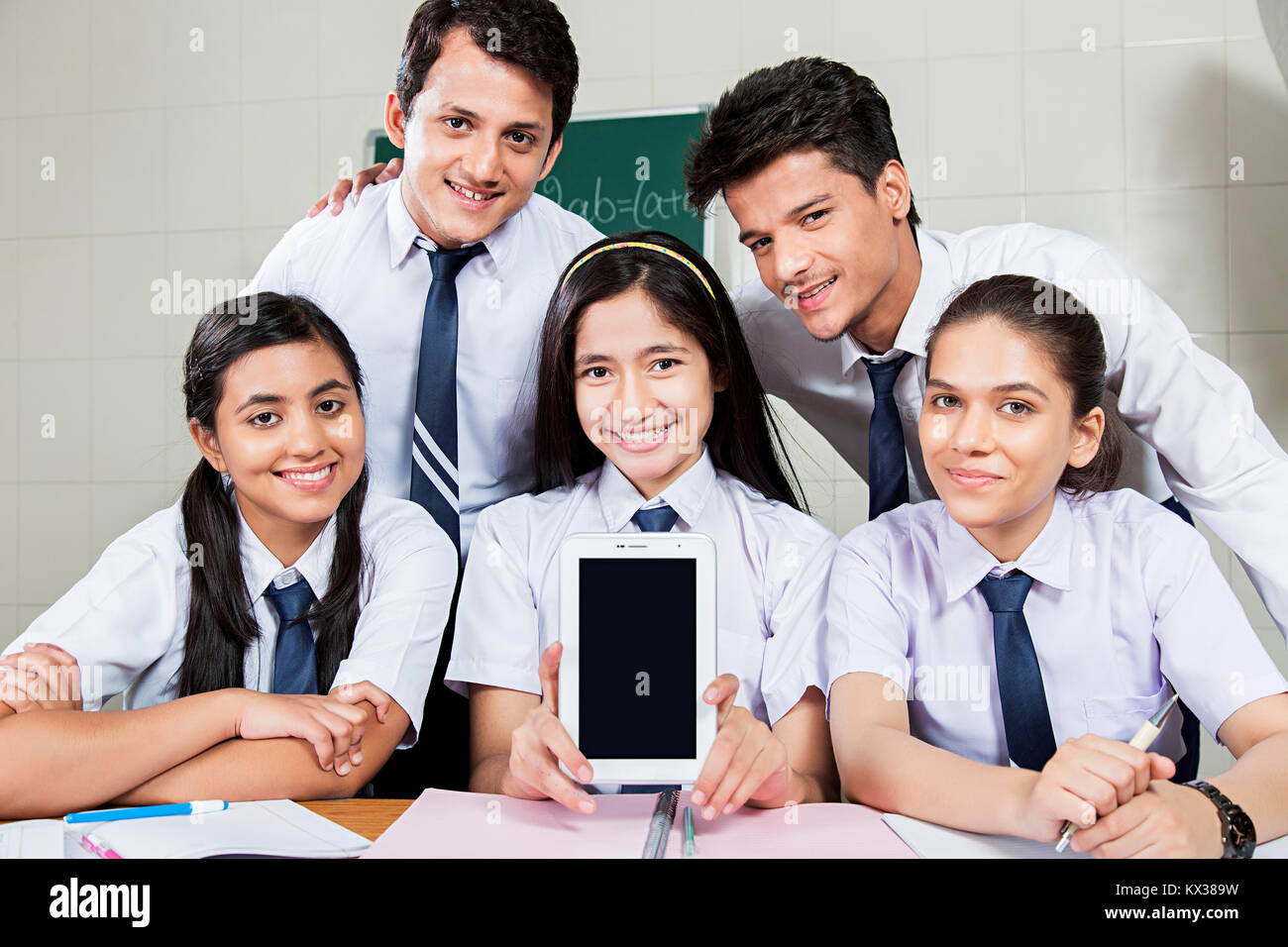 Indian School Students Friends Classmate Showing Mobile Tablet Pc Class ...