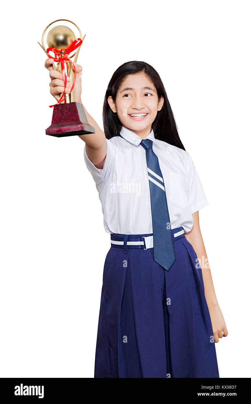 Victory smiling standing showing holding trophy looking away hi-res ...