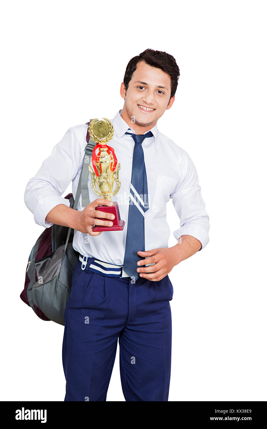 Boy holding trophy smiling hi-res stock photography and images - Alamy