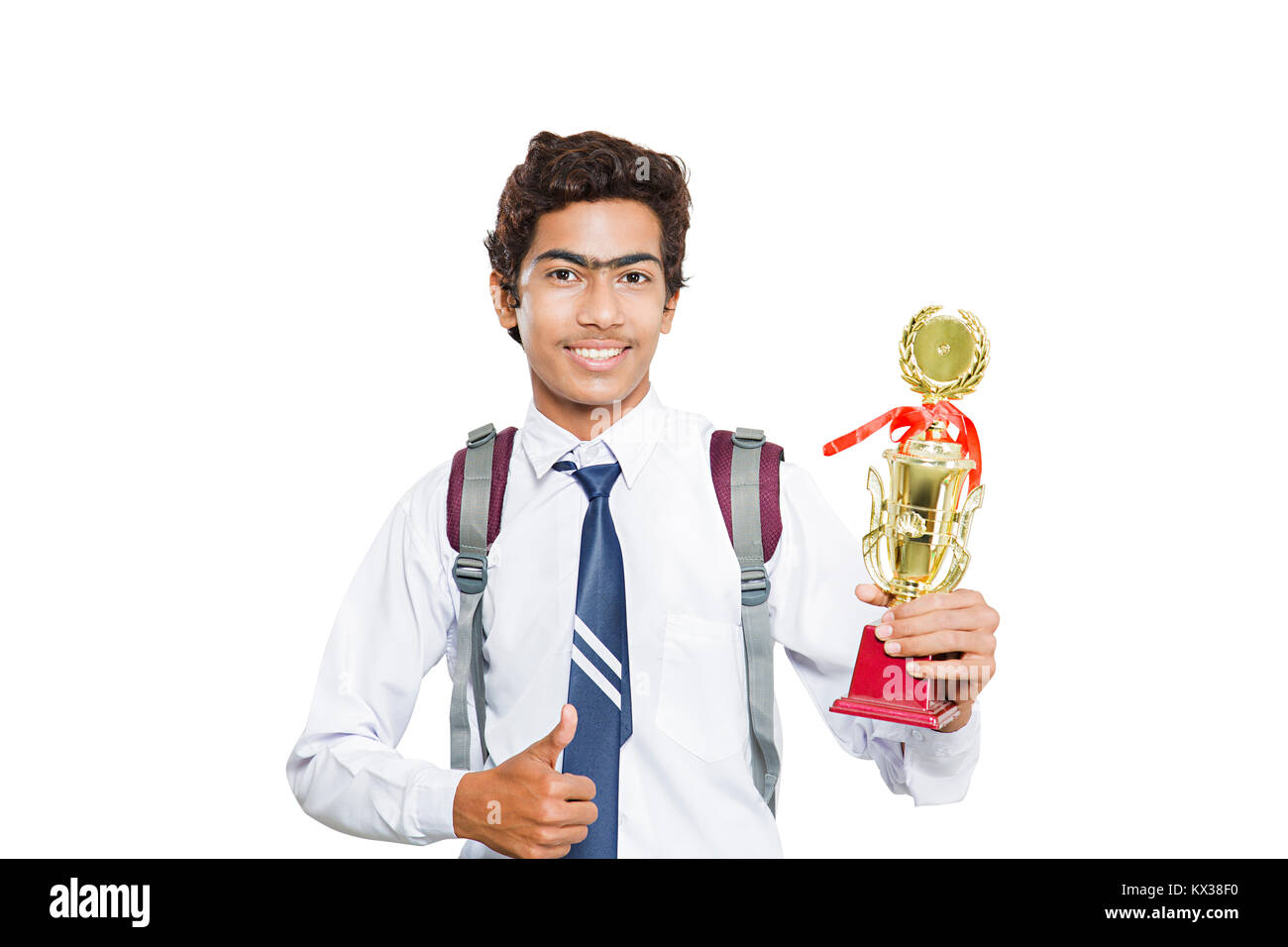 Boy holding trophy smiling hi-res stock photography and images - Alamy