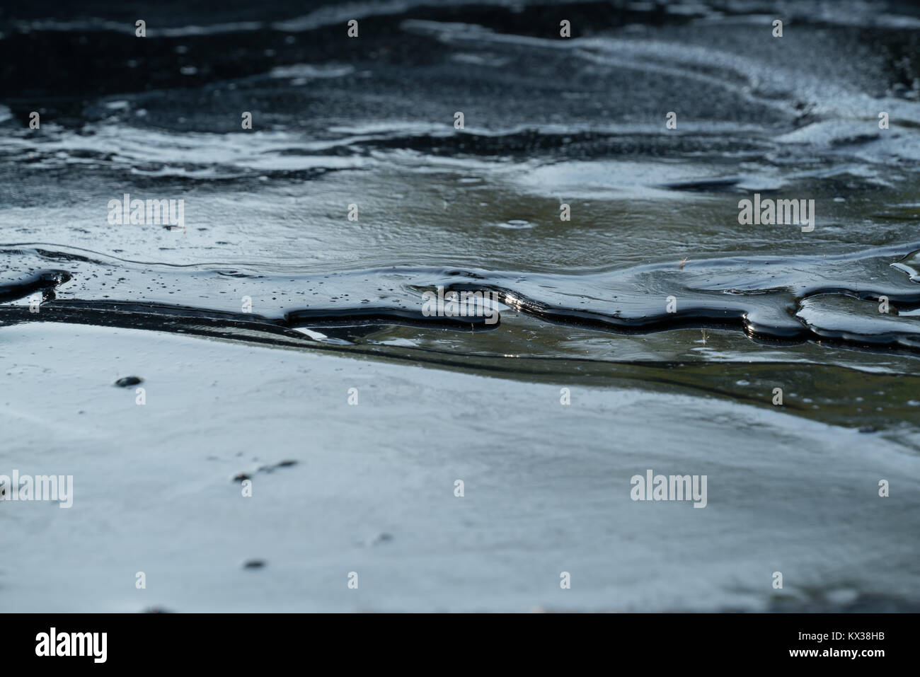 crude oil surface background textured Stock Photo - Alamy