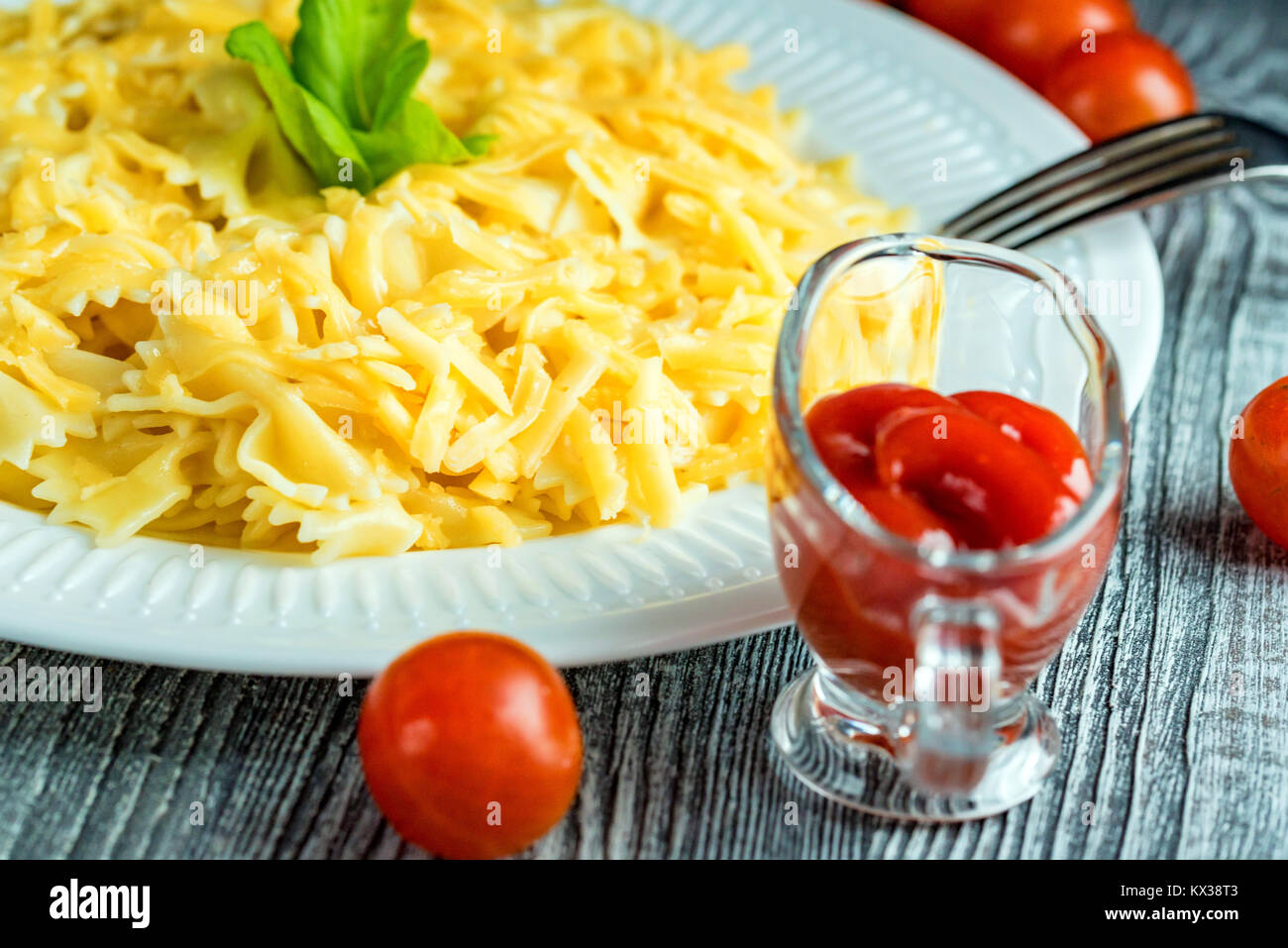 Traditional Italian pasta or fussili with cheese Stock Photo - Alamy
