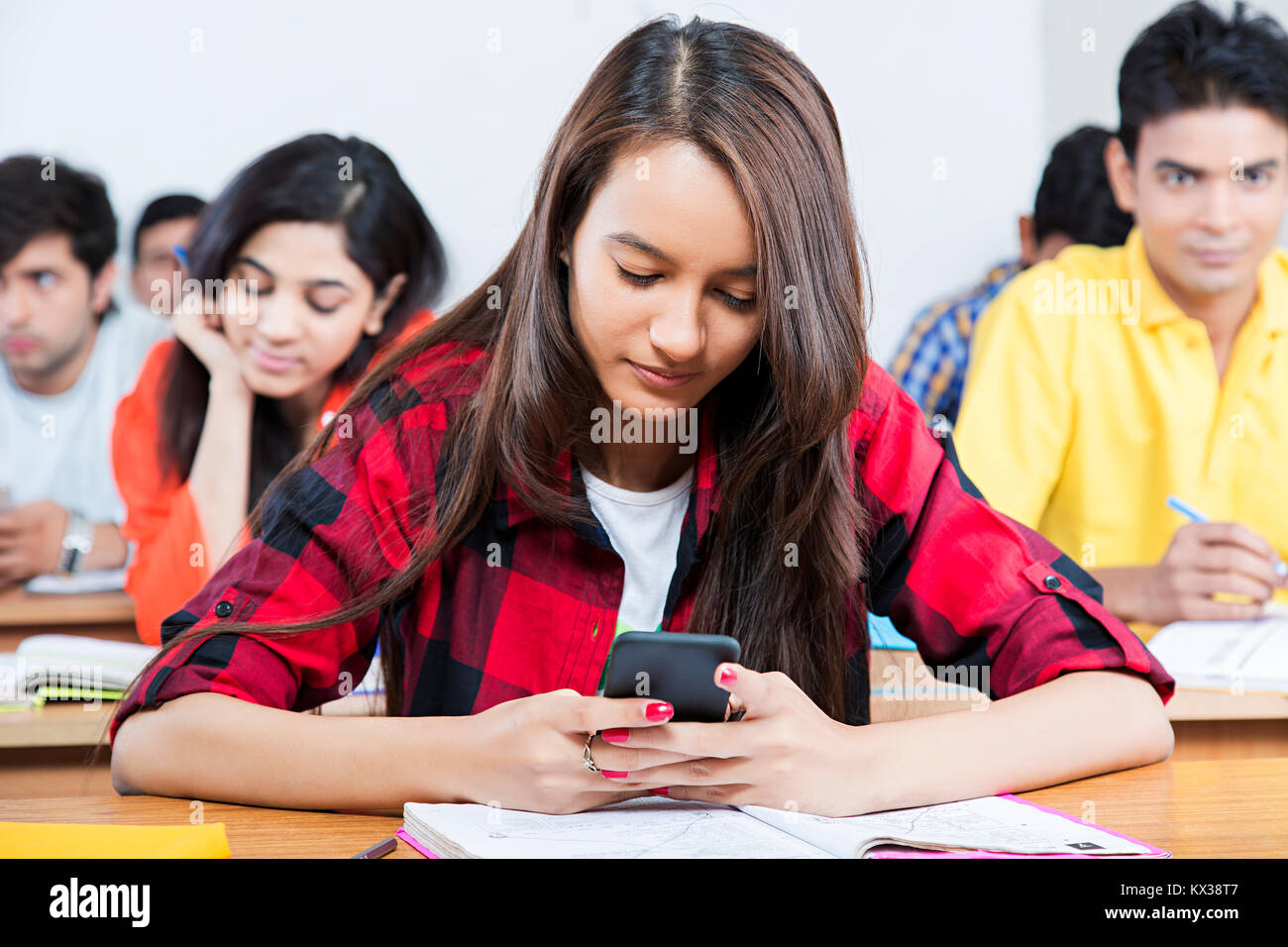 1 Indian Young Girl Student Reading Text Messaging Phone Classroom ...