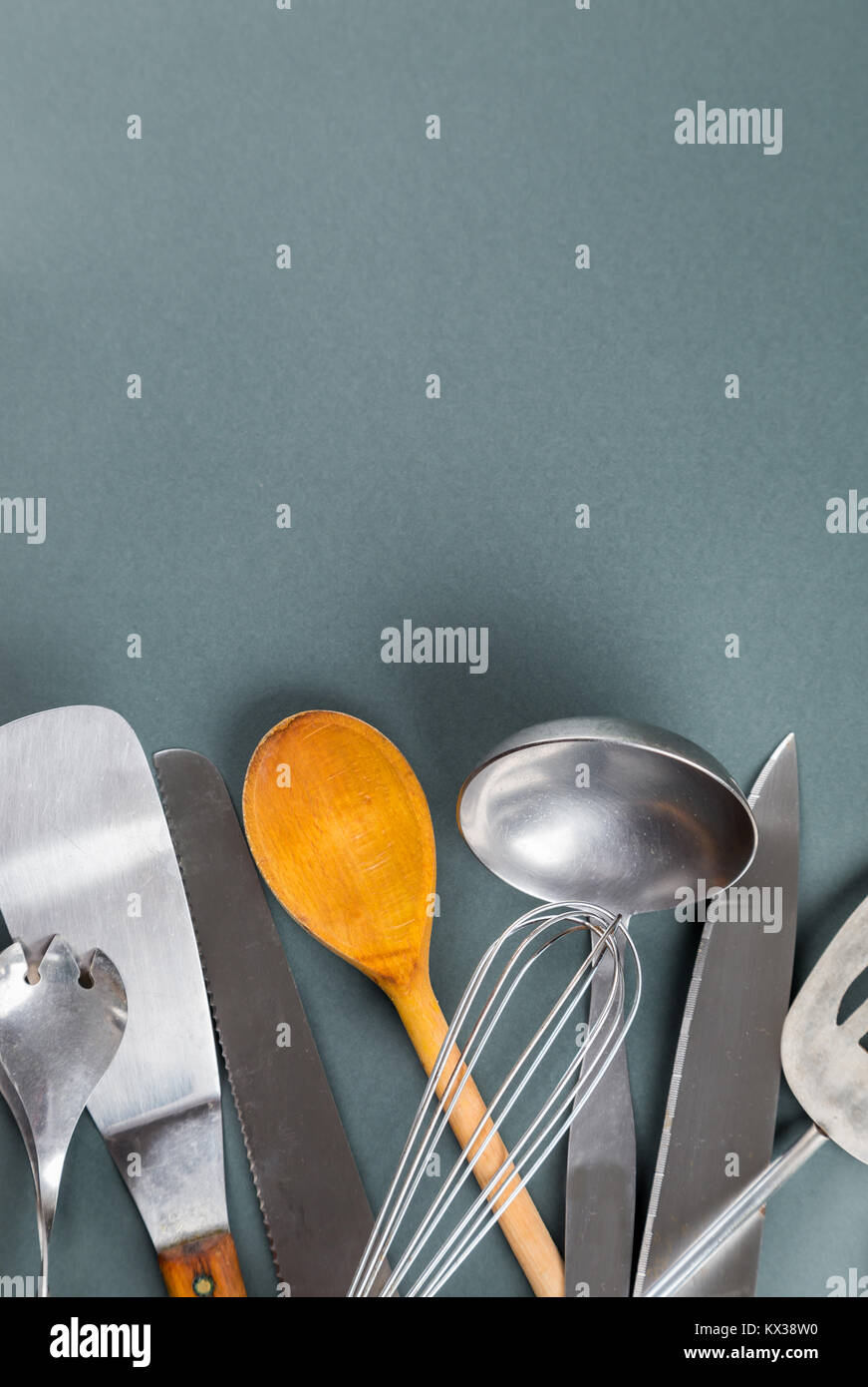 Used home kitchenware with scratches on gray paper background Stock ...