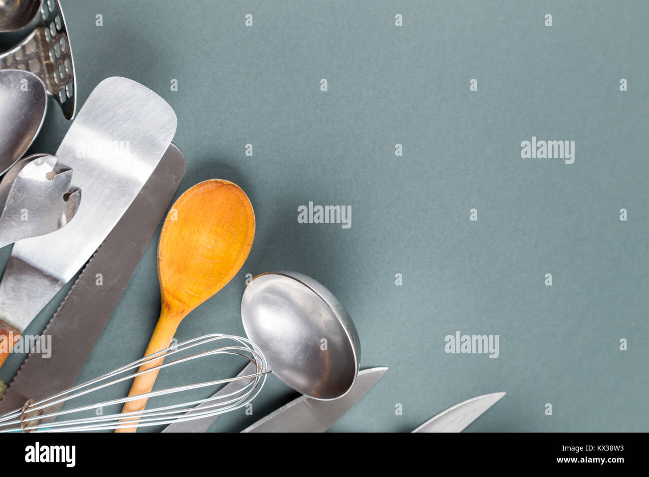 Used home kitchenware with scratches on gray paper background Stock ...