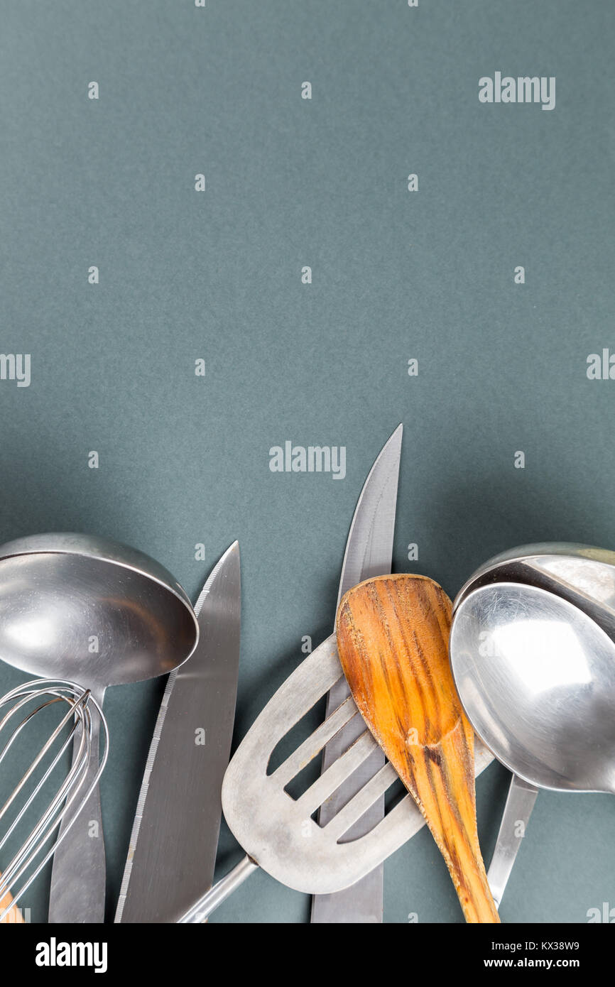 Used home kitchenware with scratches on gray paper background Stock ...