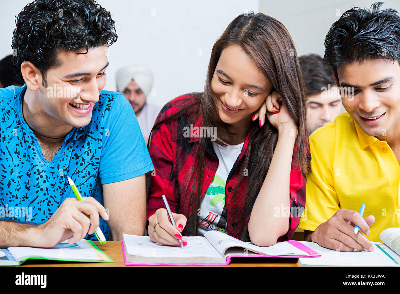 College Students Studying In Class