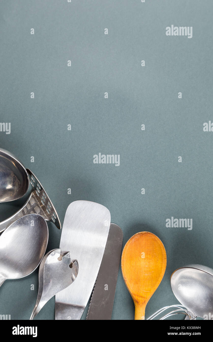 Used home kitchenware with scratches on gray paper background Stock ...