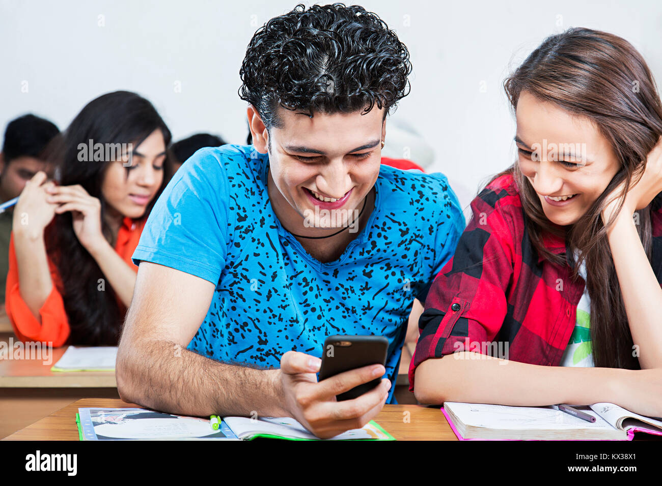2 Indian College Friend Students Reading Text Message Phone Class Stock ...
