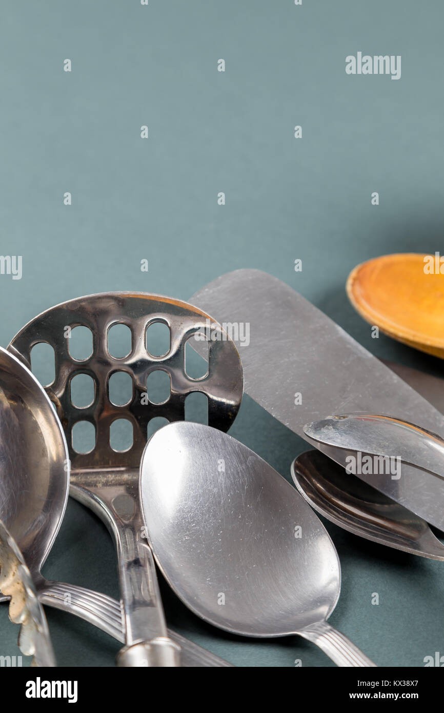 Used home kitchenware with scratches on gray paper background Stock ...