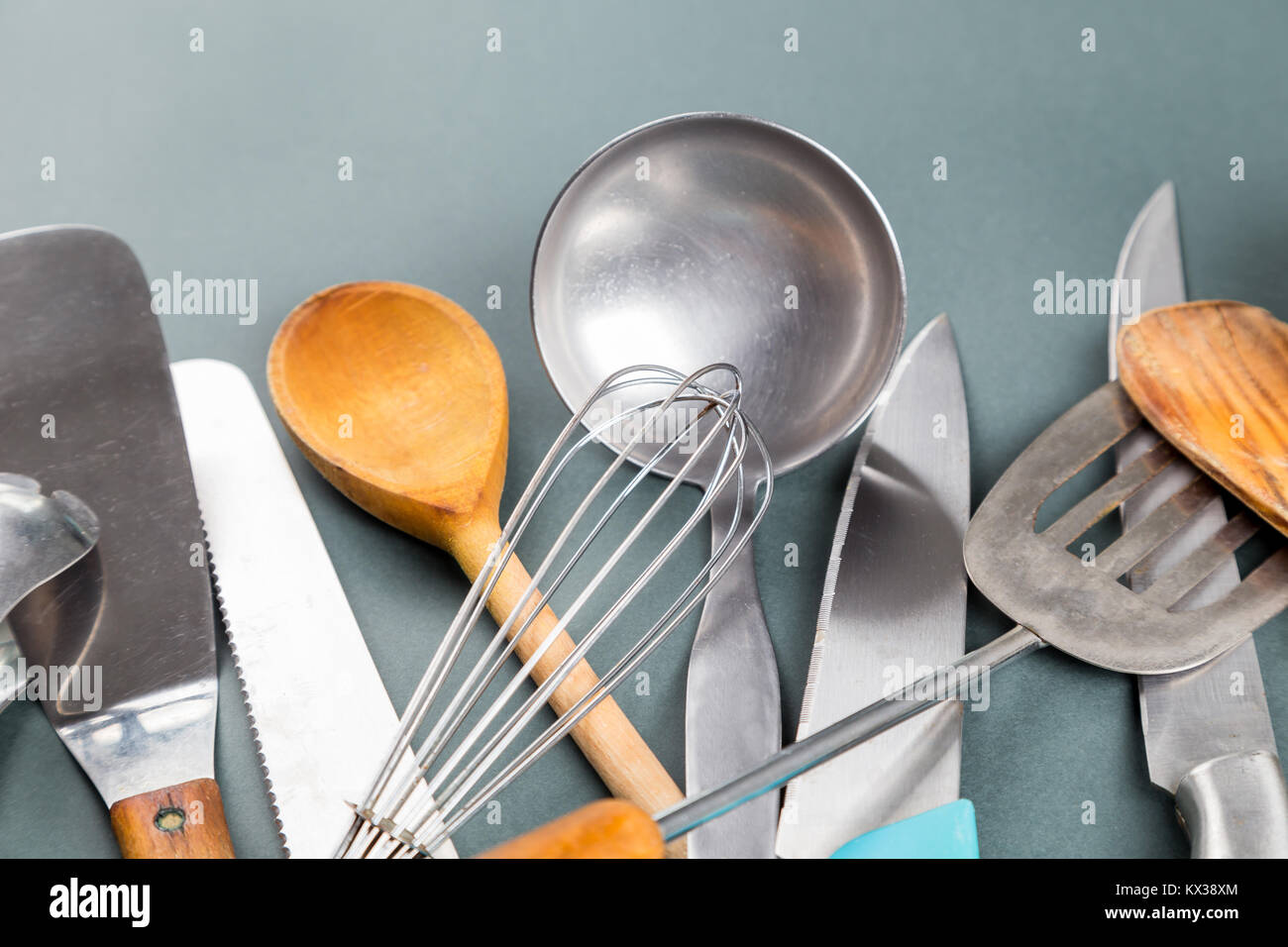 Used home kitchenware with scratches on gray paper background Stock ...