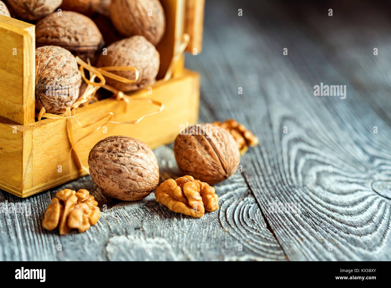 Board tasty walnuts cracker hi-res stock photography and images - Alamy