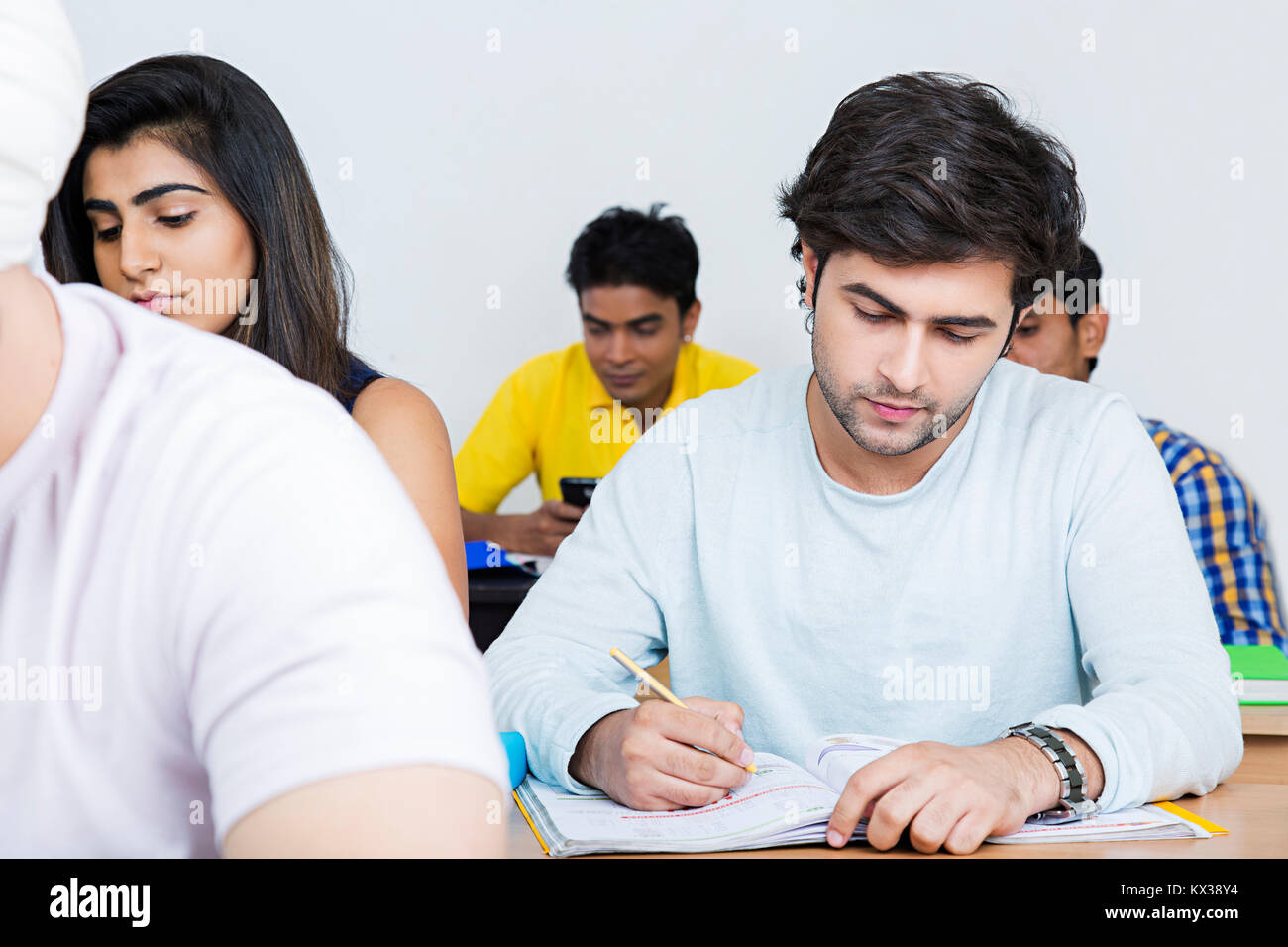 Indian College Students Group With Books