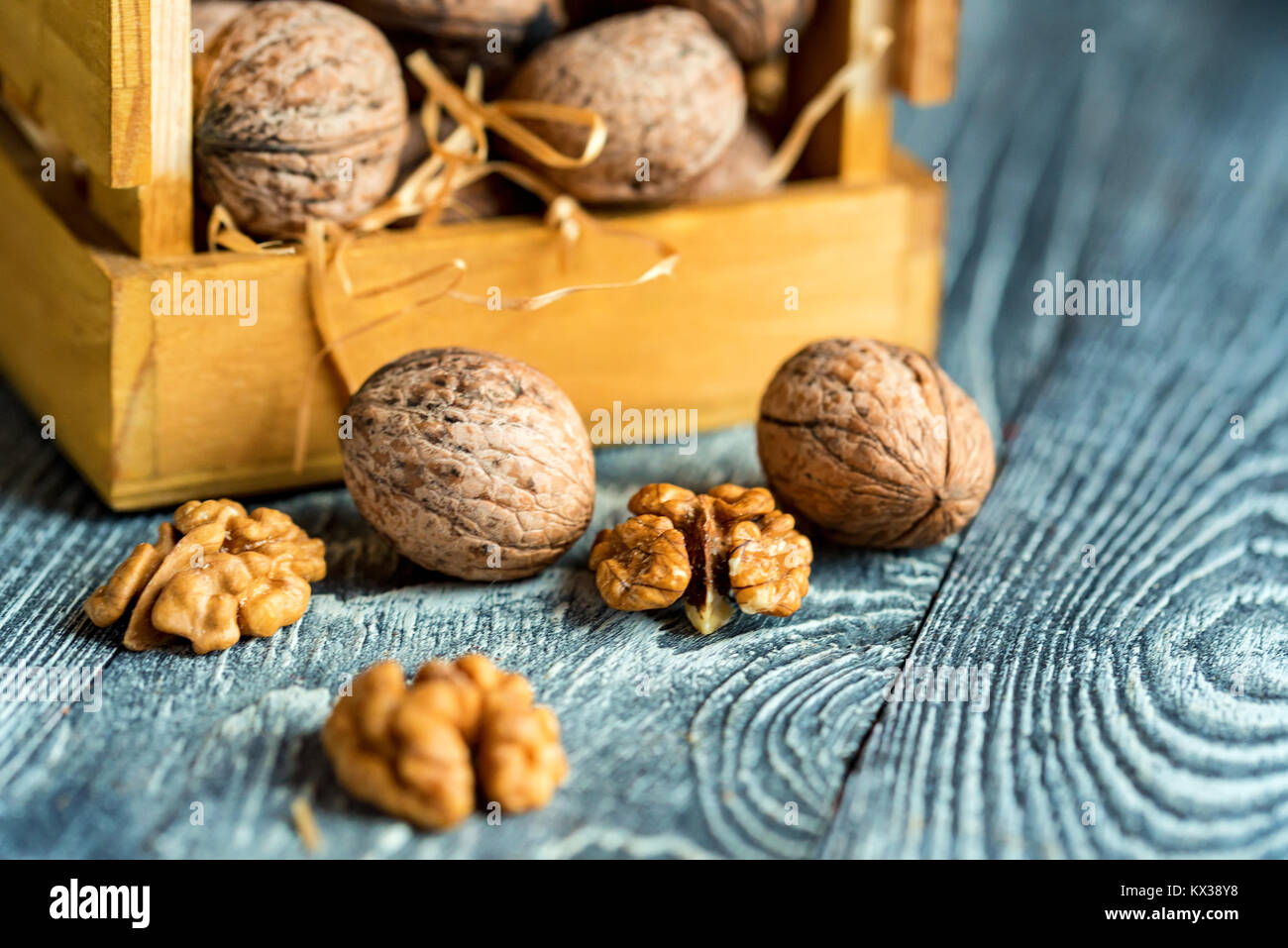 Board tasty walnuts cracker hi-res stock photography and images - Alamy