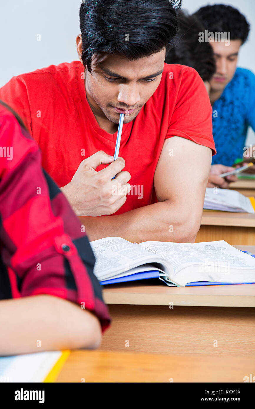 Indian Young Boy Student Reading Book Studying In Class Education Stock ...