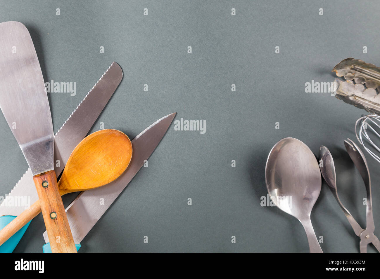 Used home kitchenware with scratches on gray paper background Stock ...