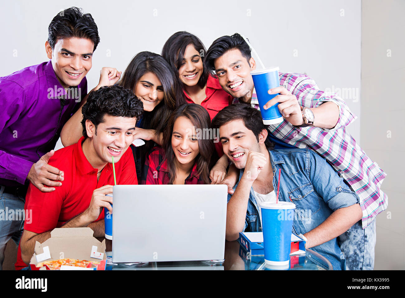 Group Indian College Friends Using Laptop In Cafeteria Happy Enjoying