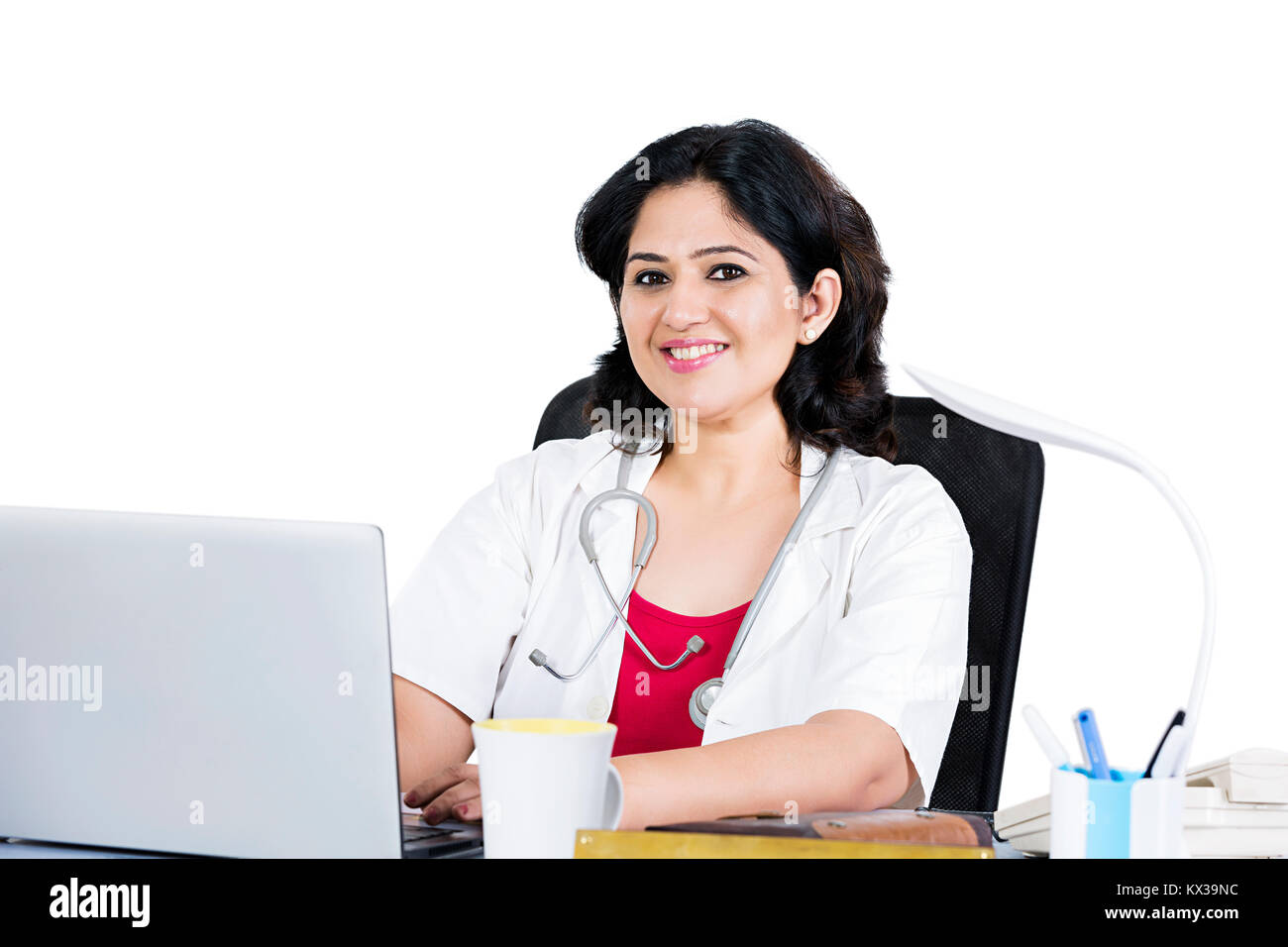 Indian Medical Female Doctor Using Laptop In Clinic Stock Photo - Alamy