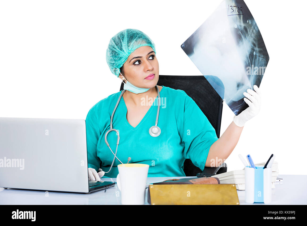 Female indian doctor holding x ray hi-res stock photography and images ...