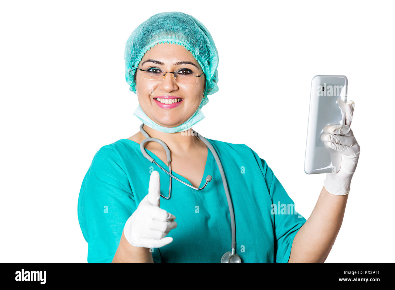 Indian Surgeon Doctor Using Mobile Tablet And Showing Thumbs Up Stock ...