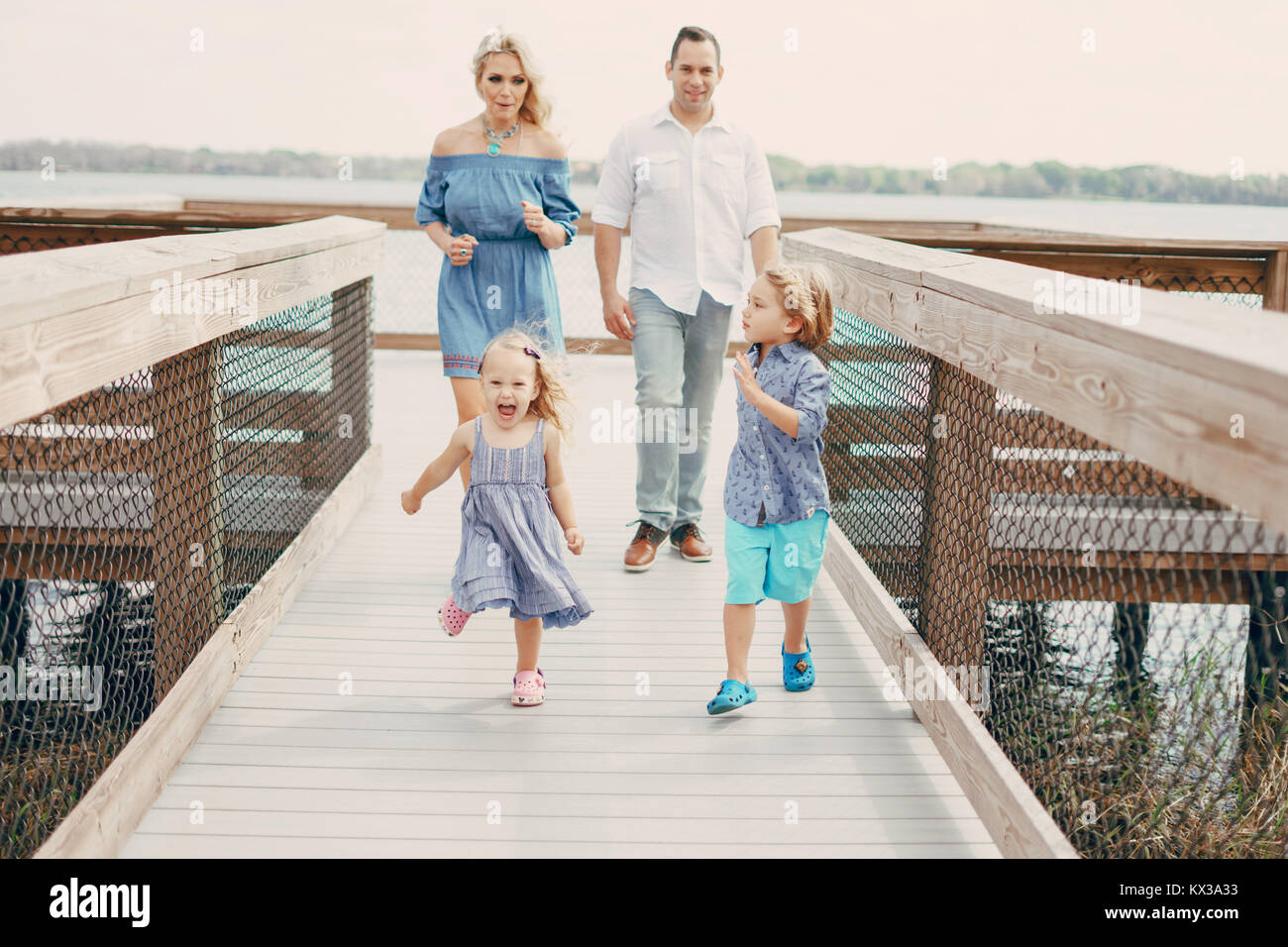 young family on the street Stock Photo - Alamy