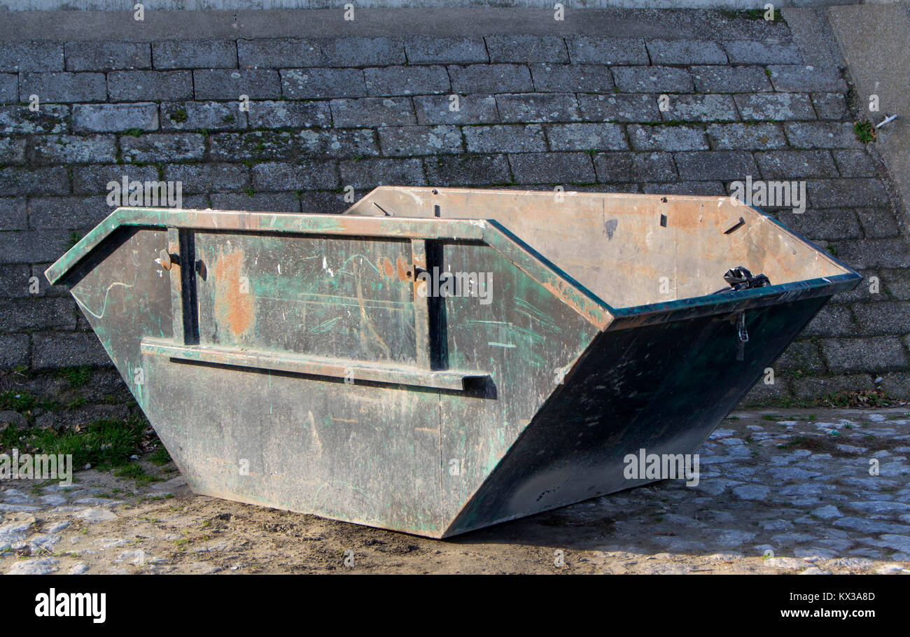 A large old garbage container for collecting more garbage Stock Photo ...