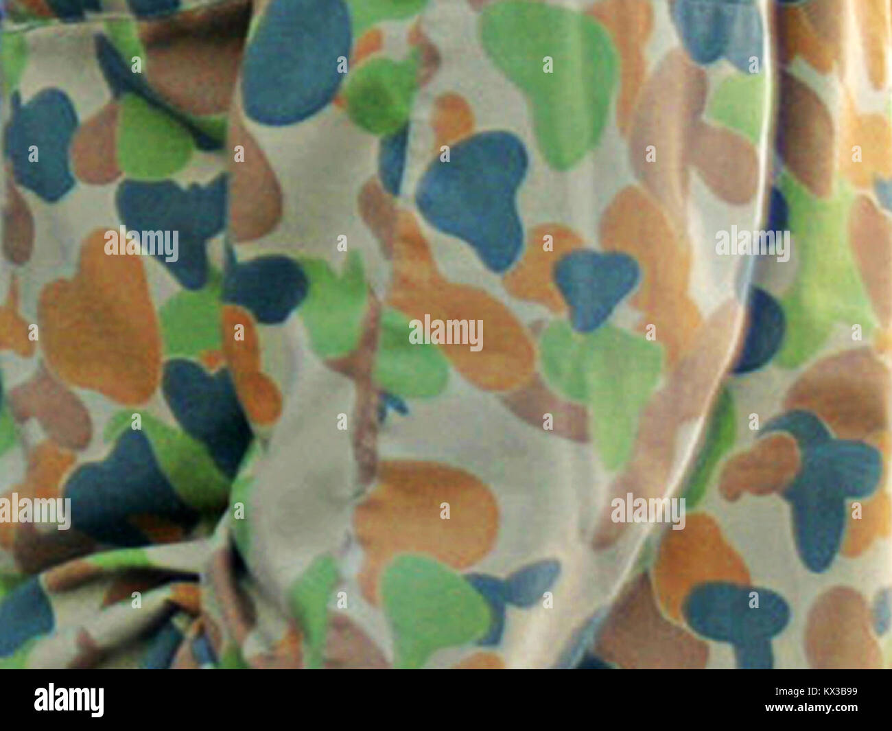 This closeup image shows the Detail Protection Combat Uniform (DPCU ...