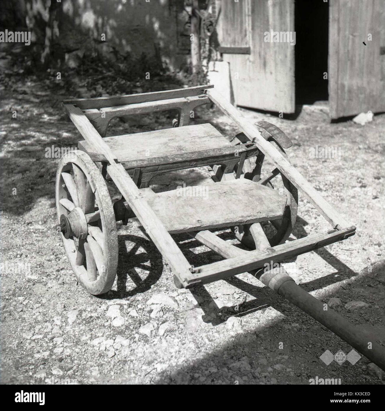 This title describes a variant of a typical two-wheeled cart used for ...