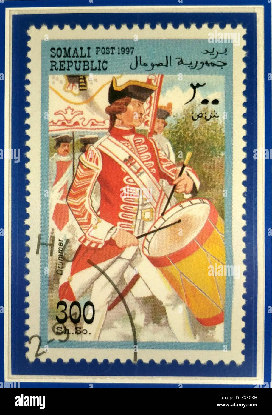 This 1997 stamp from the Somali Republic features an image of a drummer ...