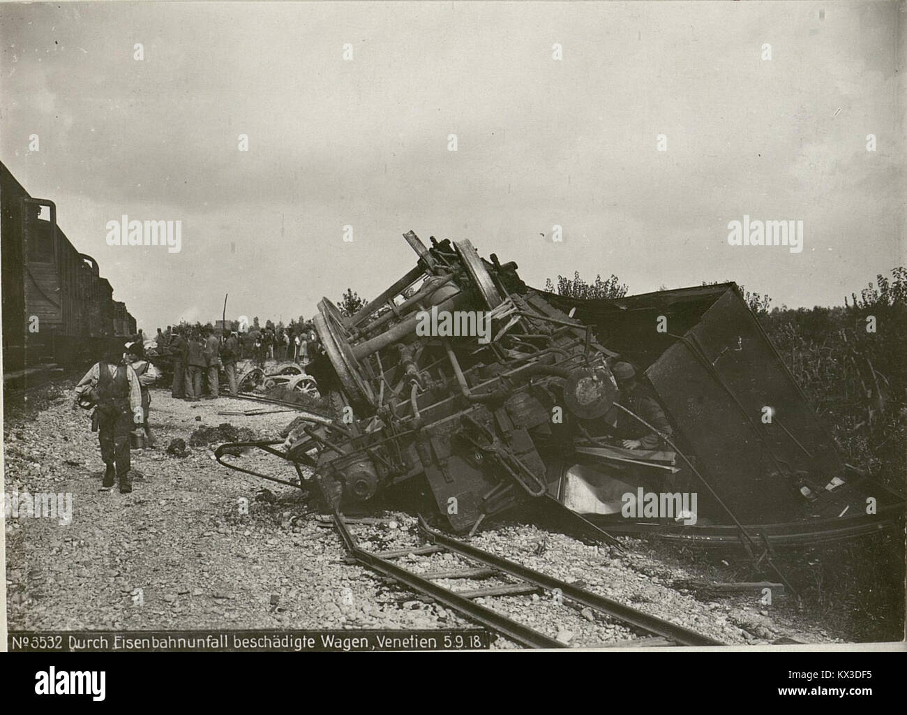 A photograph depicting damaged railway cars in the Veneto region of ...