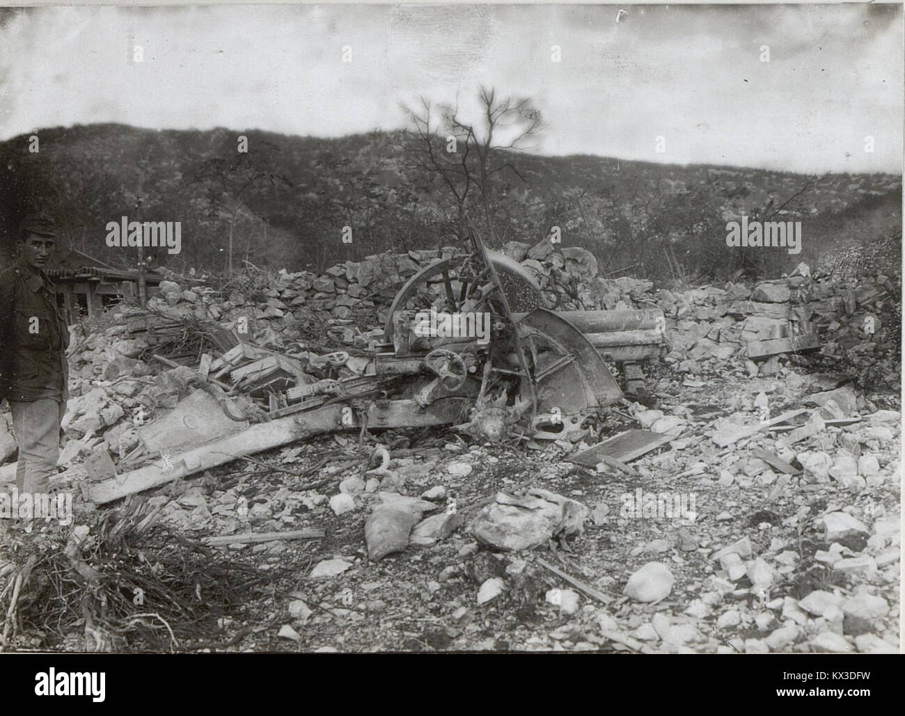 This image depicts an artillery piece that was destroyed by shellfire ...