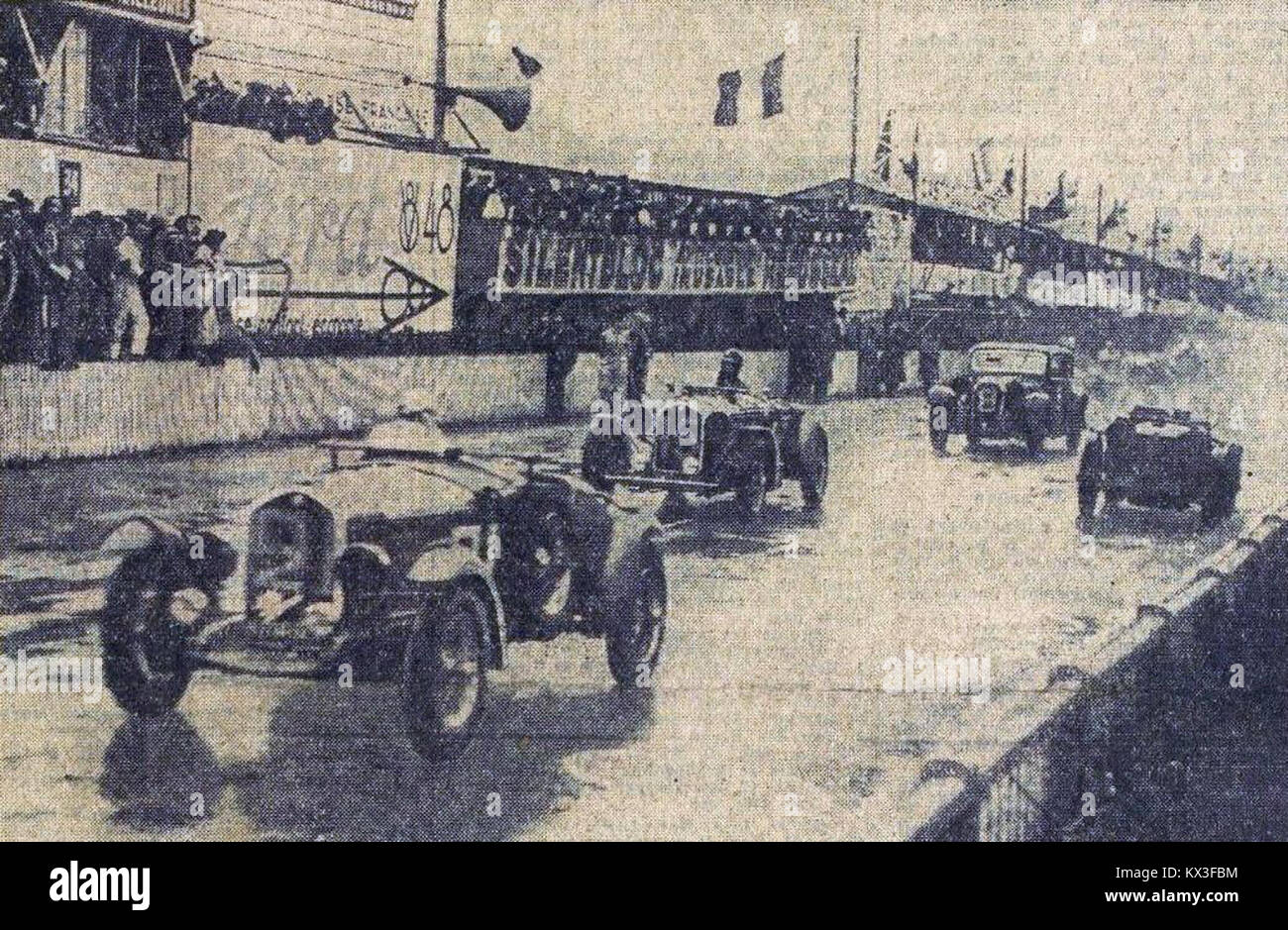 This photograph captures the start of the 1935 24 Hours of Le Mans race ...
