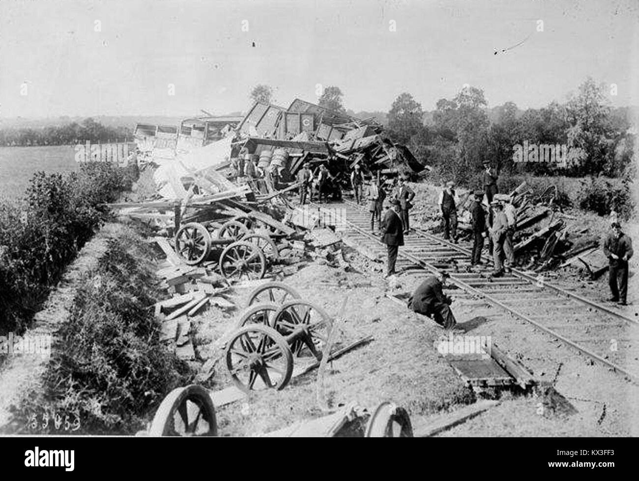 A freight train derailed in Ireland in 1919, showing railway cars off ...