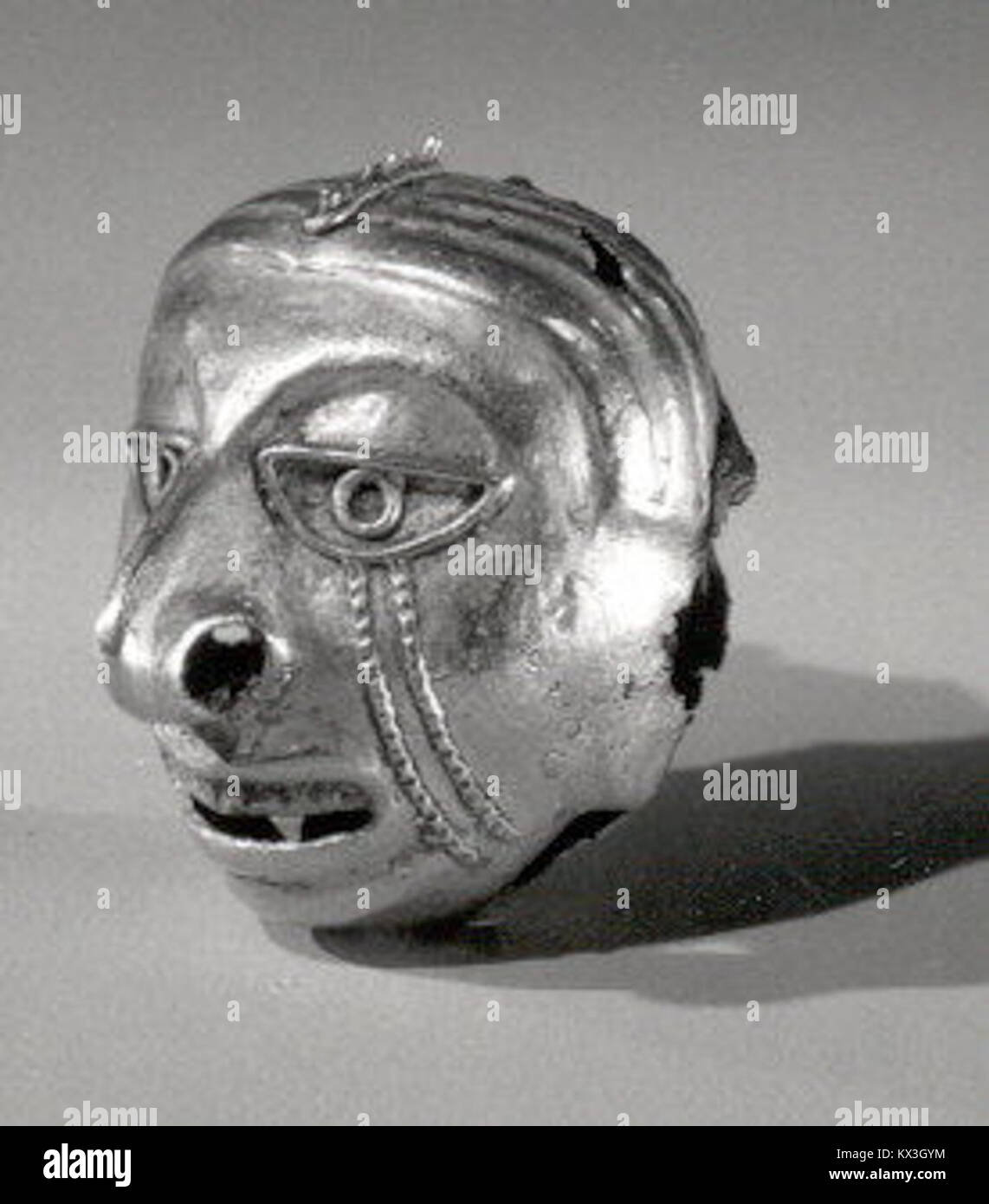 Photograph of a bell and its head from the Metropolitan Museum ...