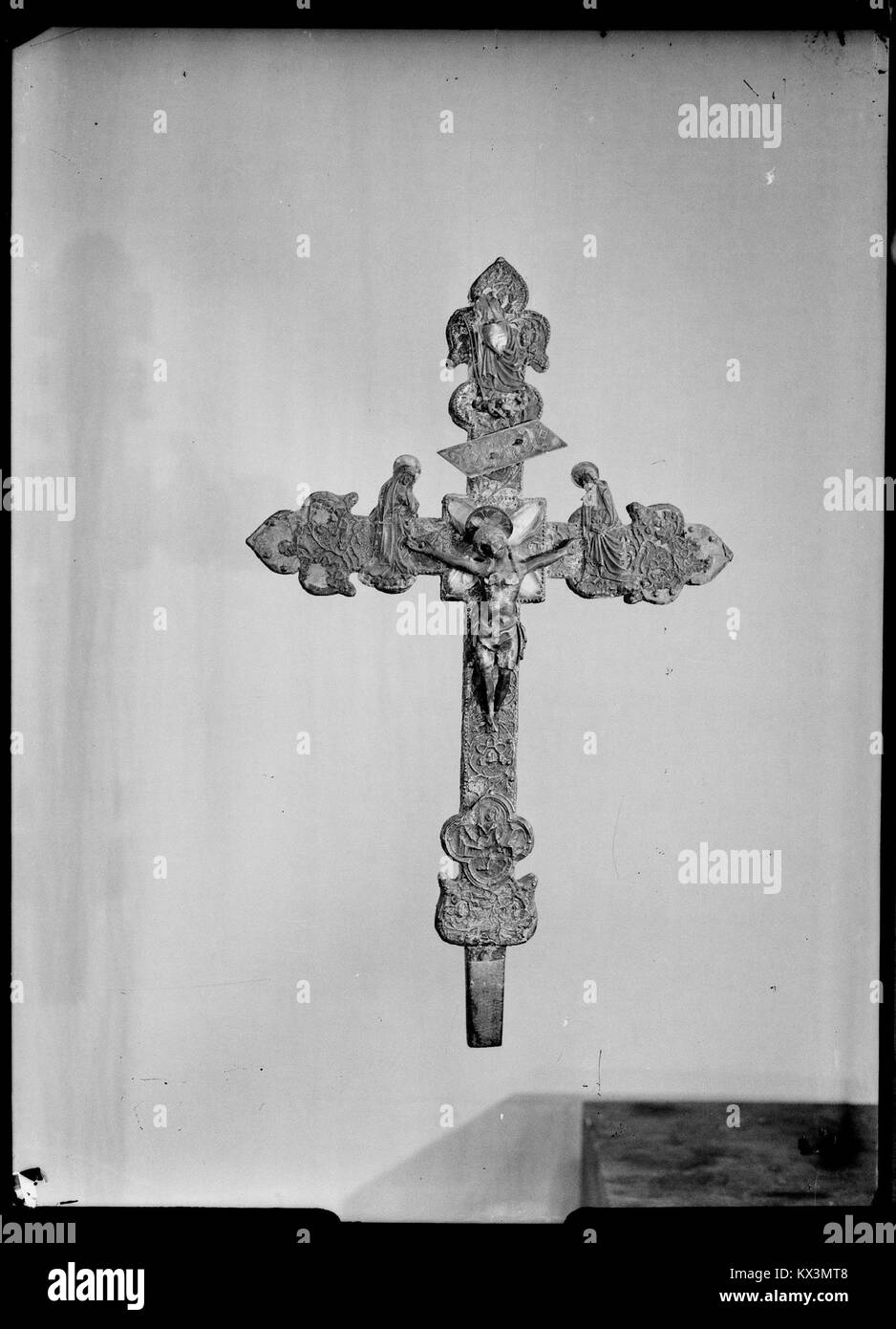 This image shows a crucifix, highlighting religious iconography and ...