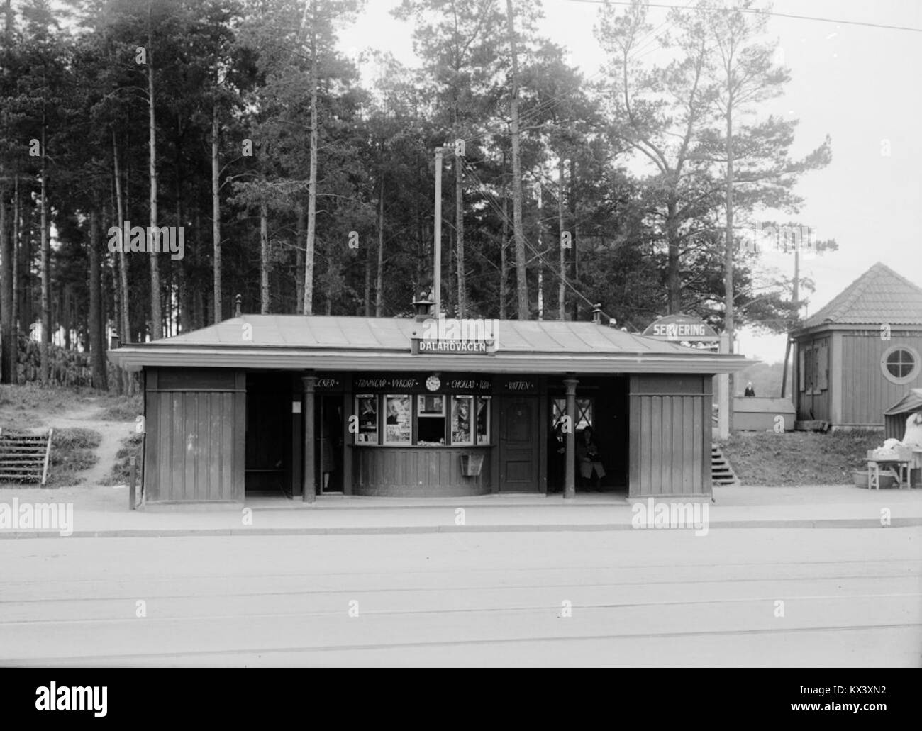 Photograph of the Dalarövägen bus stop in 1931, showing transportation ...