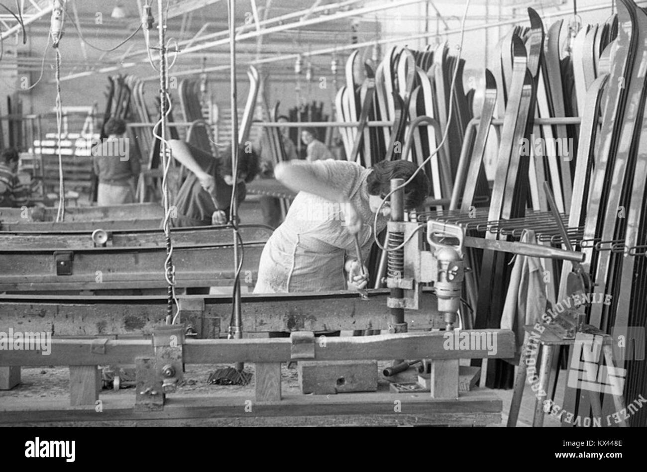 A 1965 photograph showing workers at the Elan factory in Begunje na ...