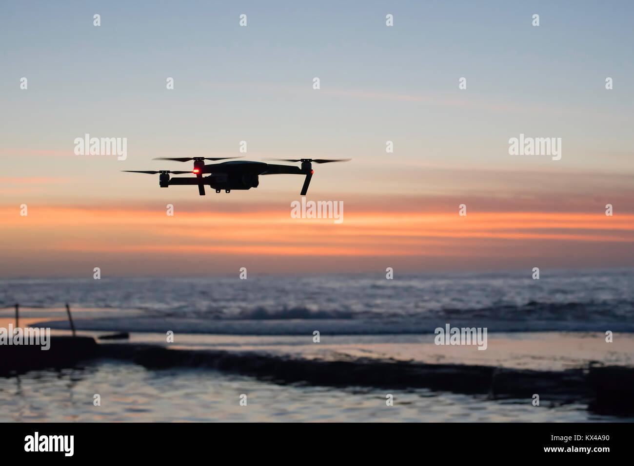 Drone hovering in front hi-res stock photography and images - Alamy