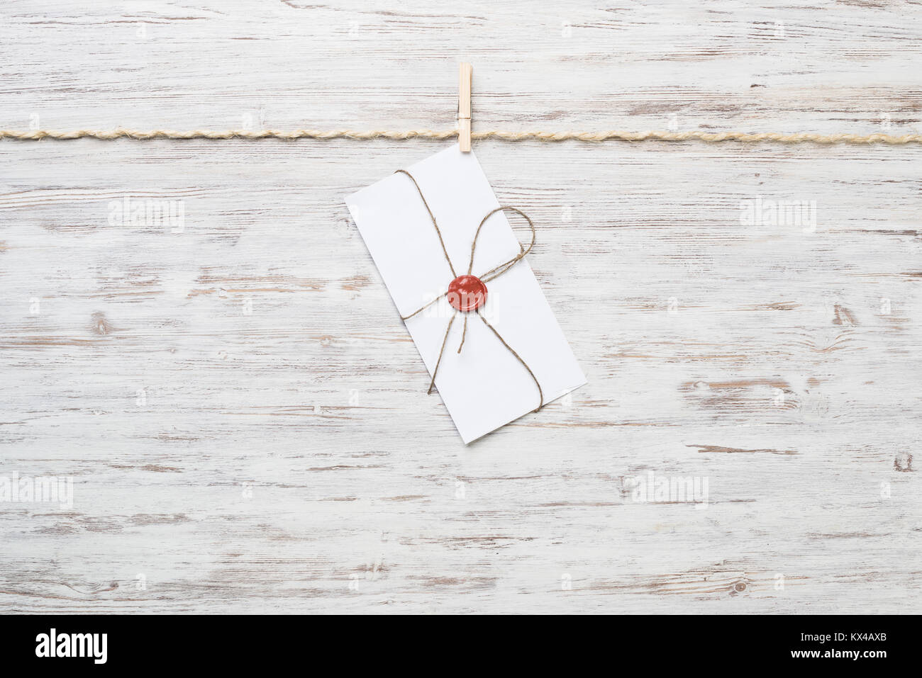 Mail envelope on rope Stock Photo - Alamy